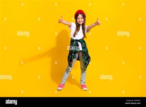 Full Size Photo Of Adorable Schoolgirl Showing Double Thumb Up Wear Trendy White Outfit Isolated