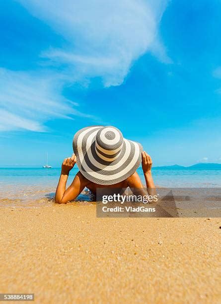 Sun Tanning Beach Photos And Premium High Res Pictures Getty Images