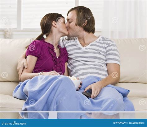 Couple Kissing On Couch Royalty Free Stock Images Image 9799529