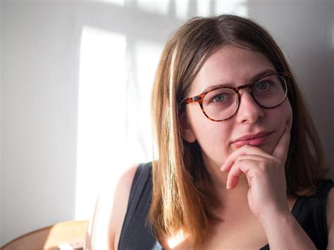 Premium Photo Portrait Of A Beautiful Young Girl In Glasses Confident In Herself And In Her