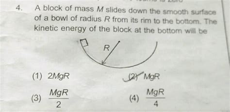 a block of mass m slides down along frictionless surface of the bowl from the rim to the bottom