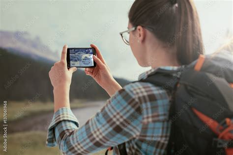 Woman Taking Nature Pictures With Her Phone Stock Foto Adobe Stock