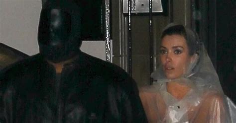 Bianca Censori Completely Naked In See Through Raincoat After Kanye