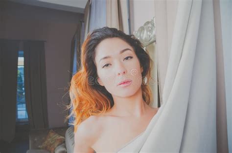Beautiful Girl In The Hotel Room In A Revealing Dress Stock Image Image Of Lifestyle Happy