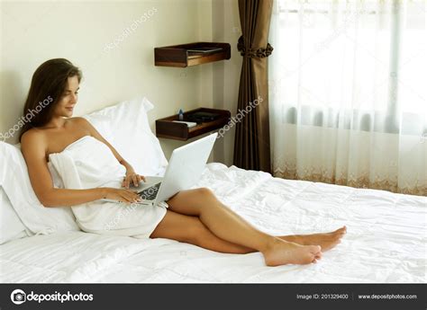 Beautiful Woman Lying Bed Using Laptop Stock Photo By AY PHOTO 201329400